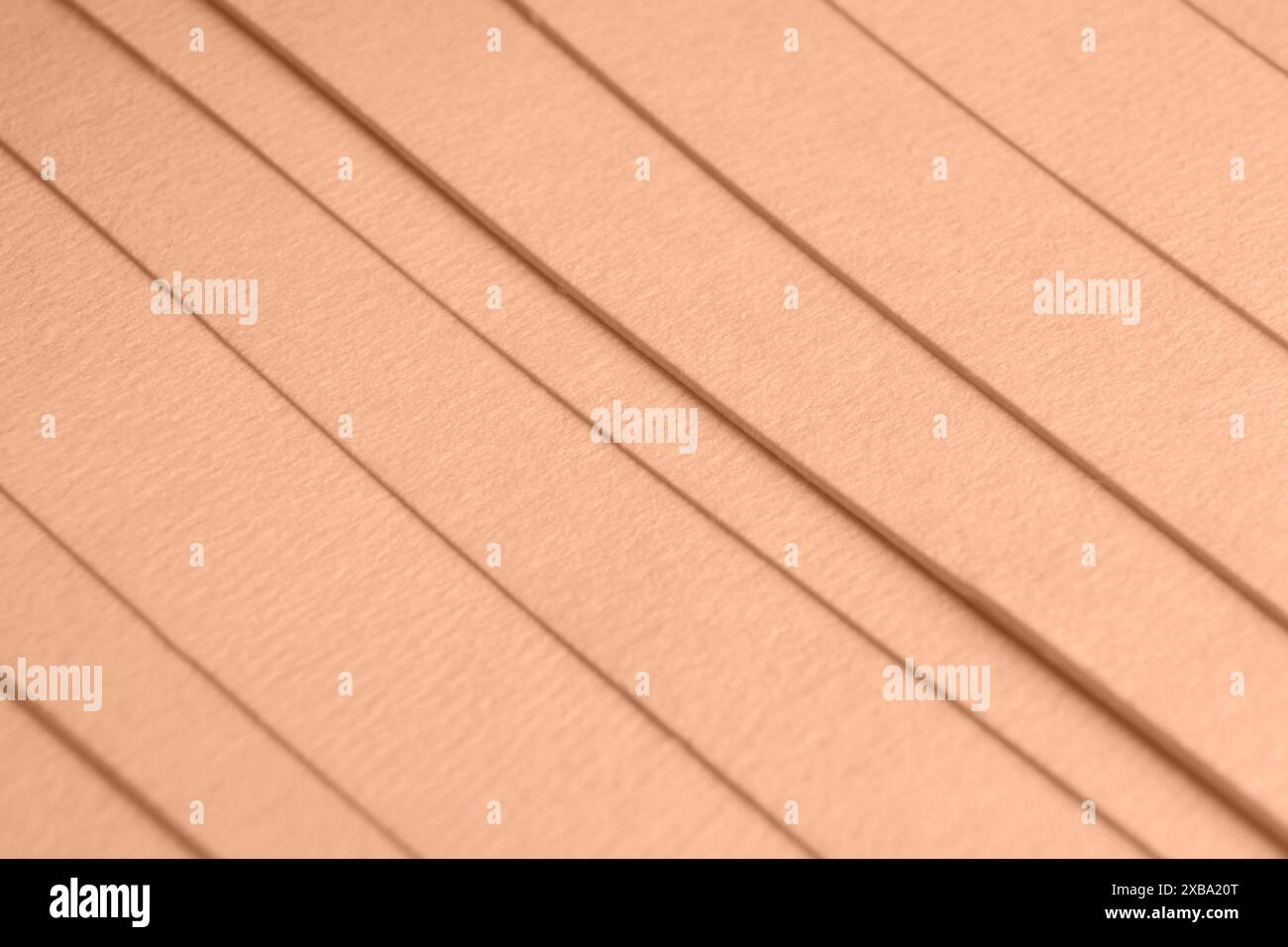 Peach fuzz color paper sheets, closeup. Trendy shade of 2024 year Stock ...