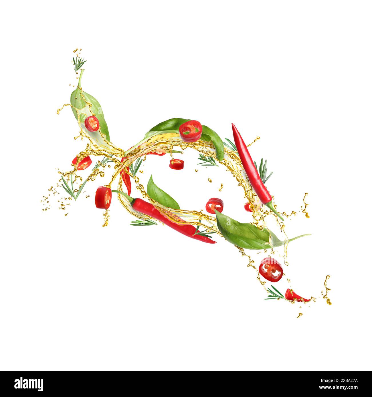 Cooking oil splash with chili pepper, basil and rosemary in air on ...
