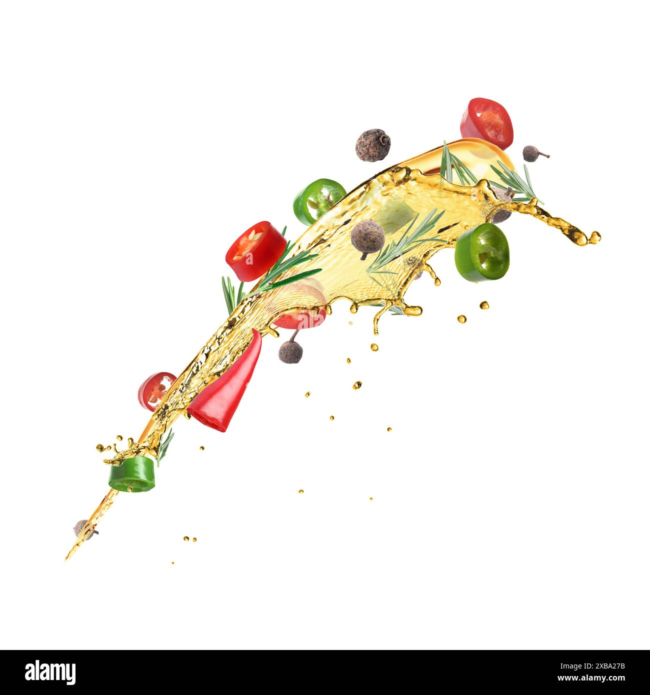 Cooking oil splash with chili peppers, rosemary and allspice in air on ...