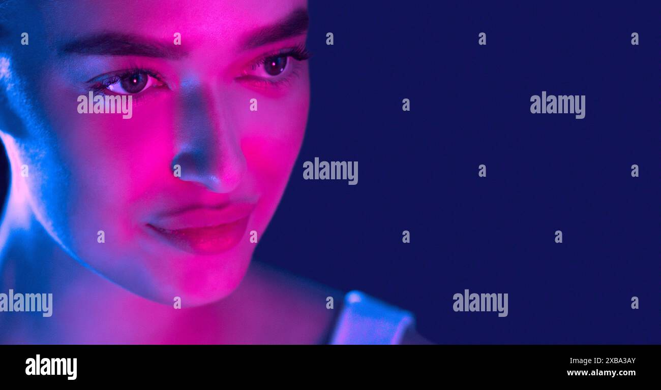 Woman Face Illuminated With Blue and Pink Lights Stock Photo - Alamy