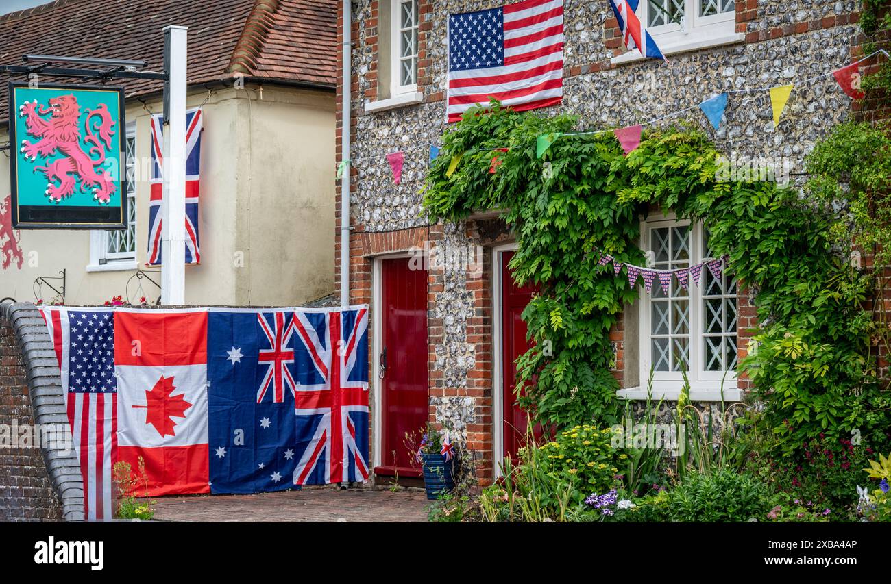 National flags commemorating D-Day hanging outside a public house in ...