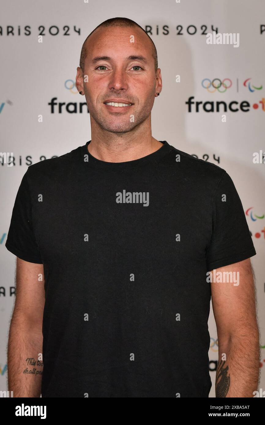 Paris, France. 11th June, 2024. French swimmer Sami El Gueddari poses for a photocall prior to ...