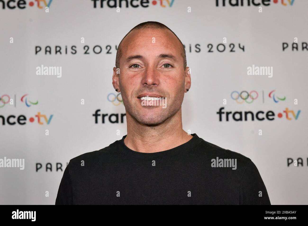 Paris, France. 11th June, 2024. French swimmer Sami El Gueddari poses for a photocall prior to ...