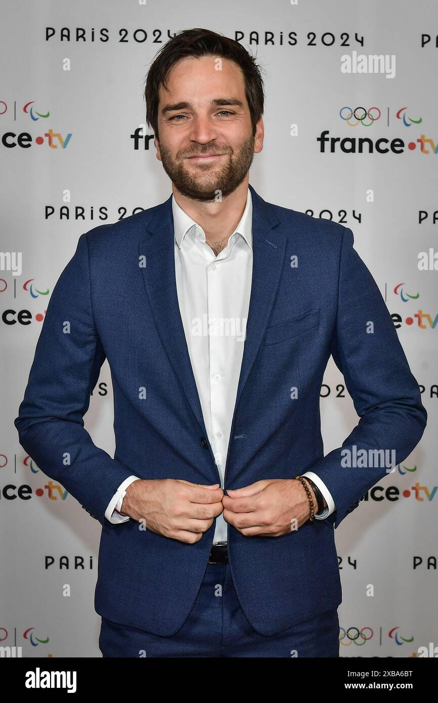 Journalist Samuel Ollivier poses for a photocall prior to the France ...