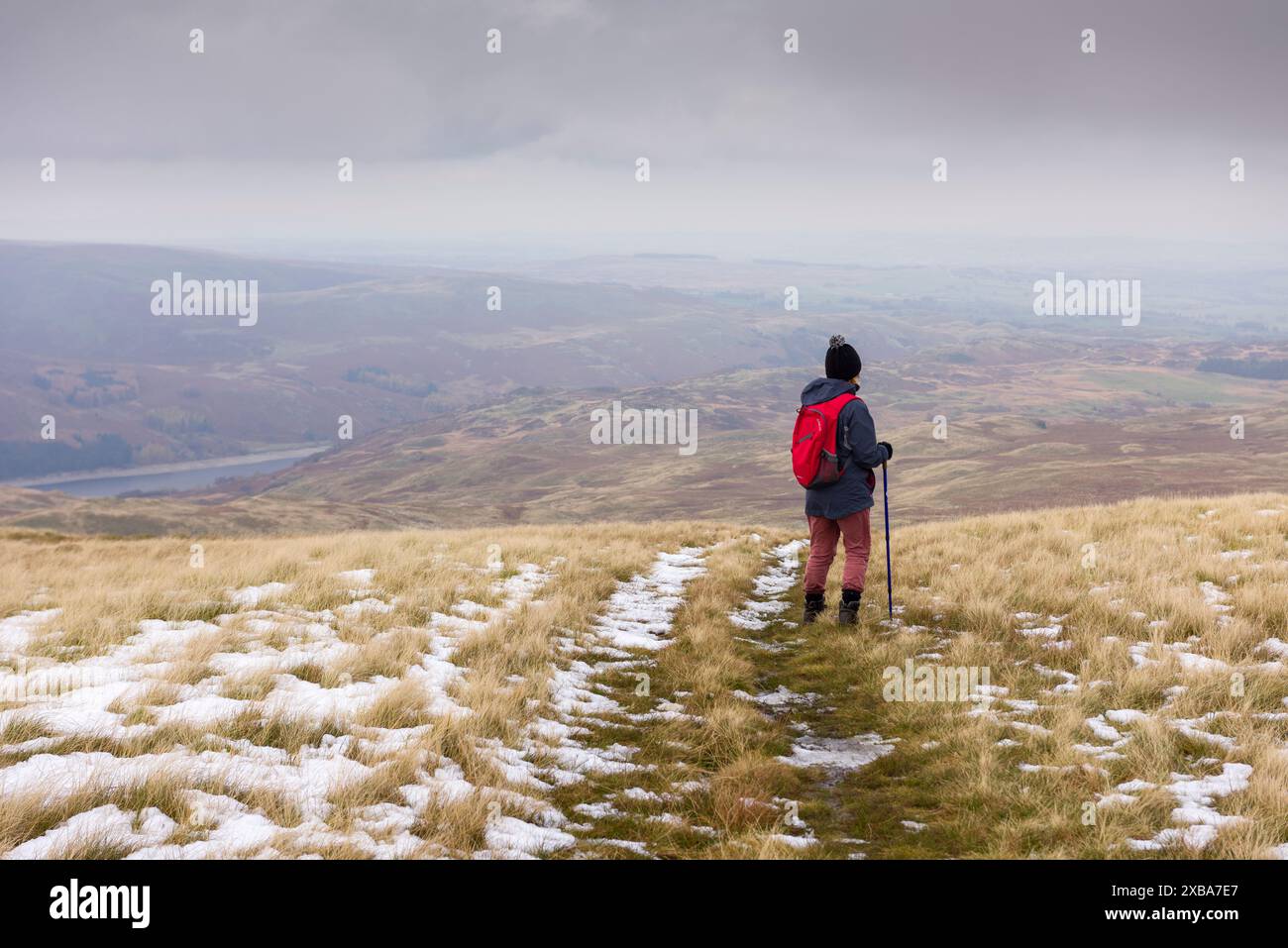 A woman walker enjoying the view over Mardale Common and Haweswater ...