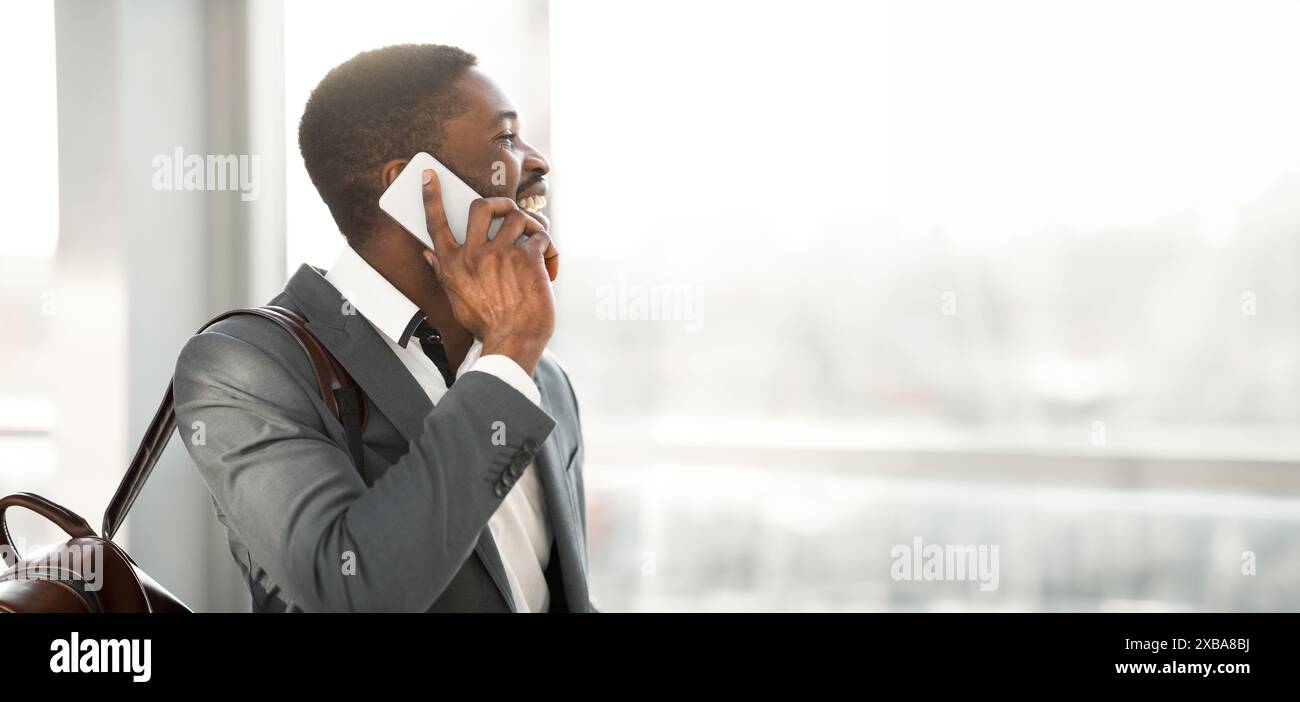 Travelling Businessman Making Phone Call, Arriving at Airport Stock ...