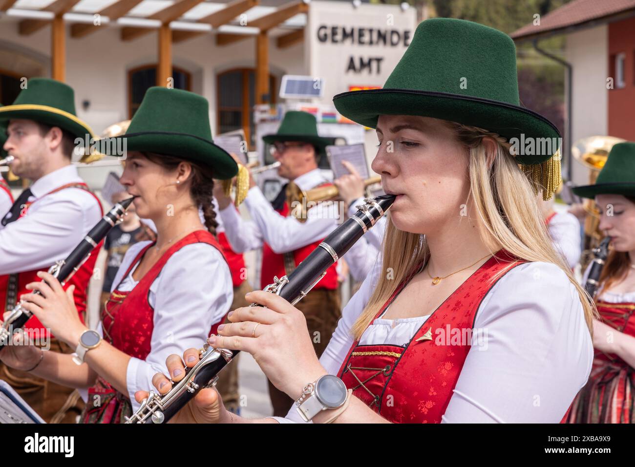 AUSTRIA, DORFGASTEIN - 1 MAI, 2024: Young Woman Playing Clarinet in a ...