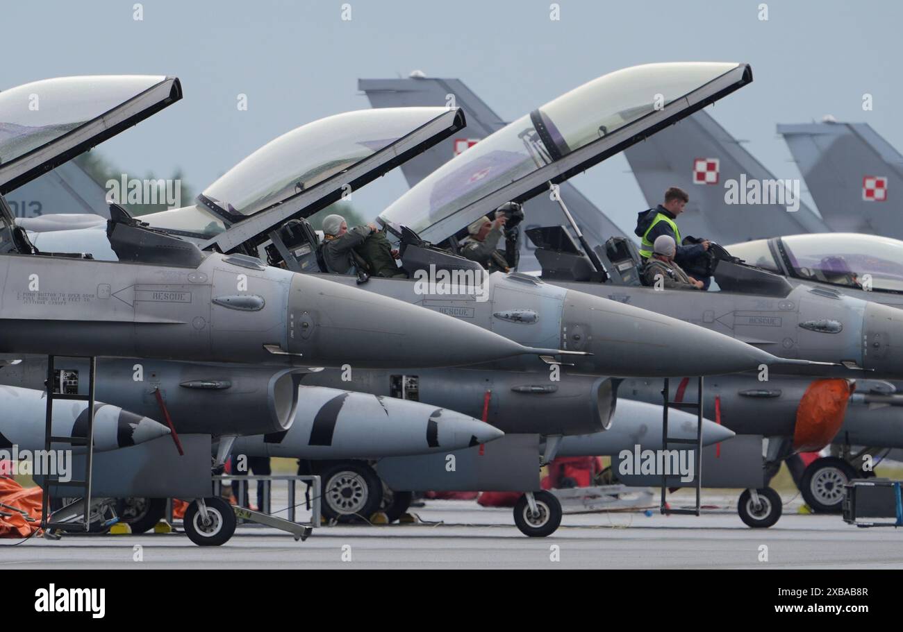 Jagel, Germany. 11th June, 2024. Pilots prepare in the cockpits of ...