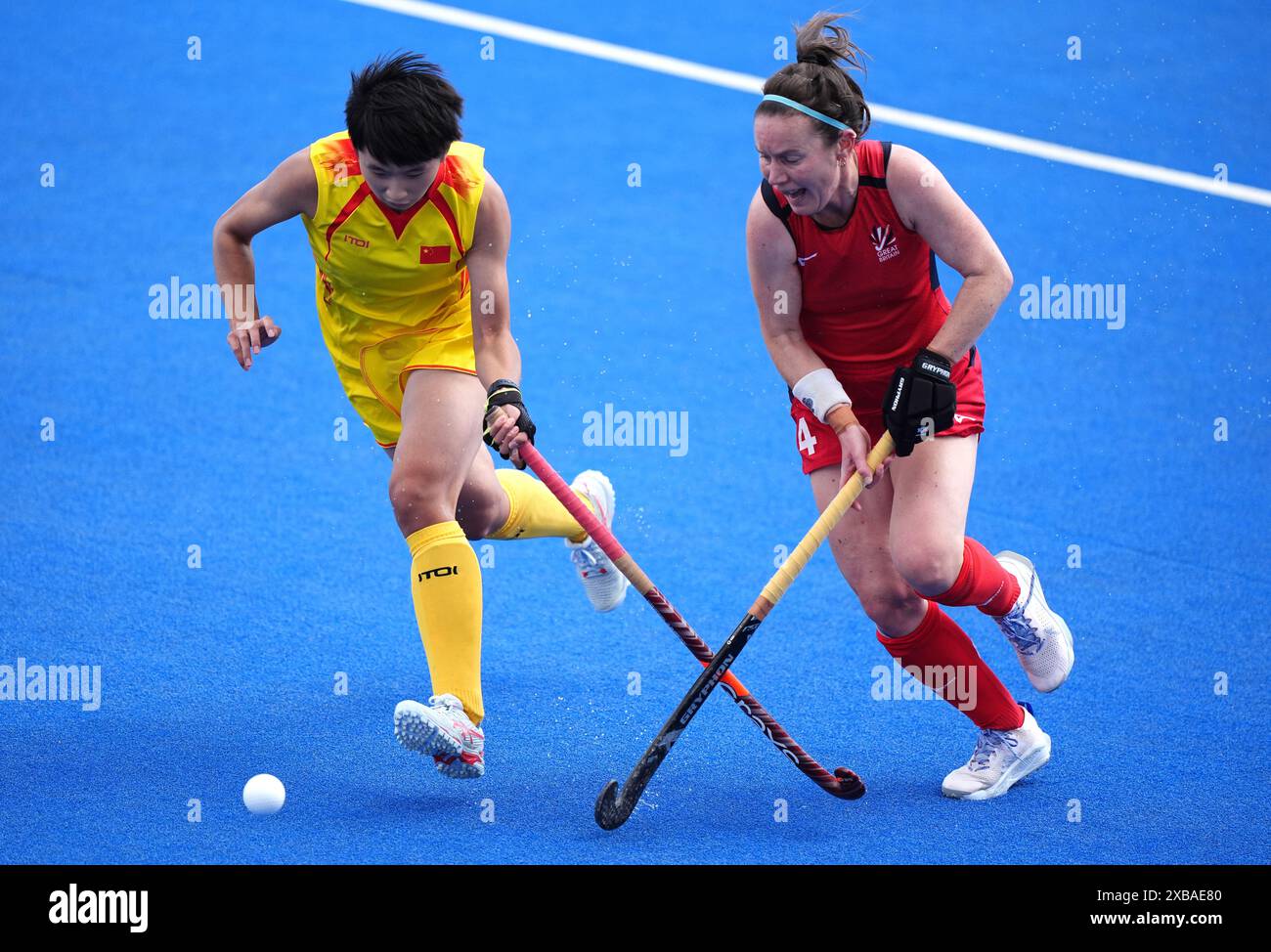 Great Britain's Laura Roper and China's Liu Chencheng (left) battle for ...