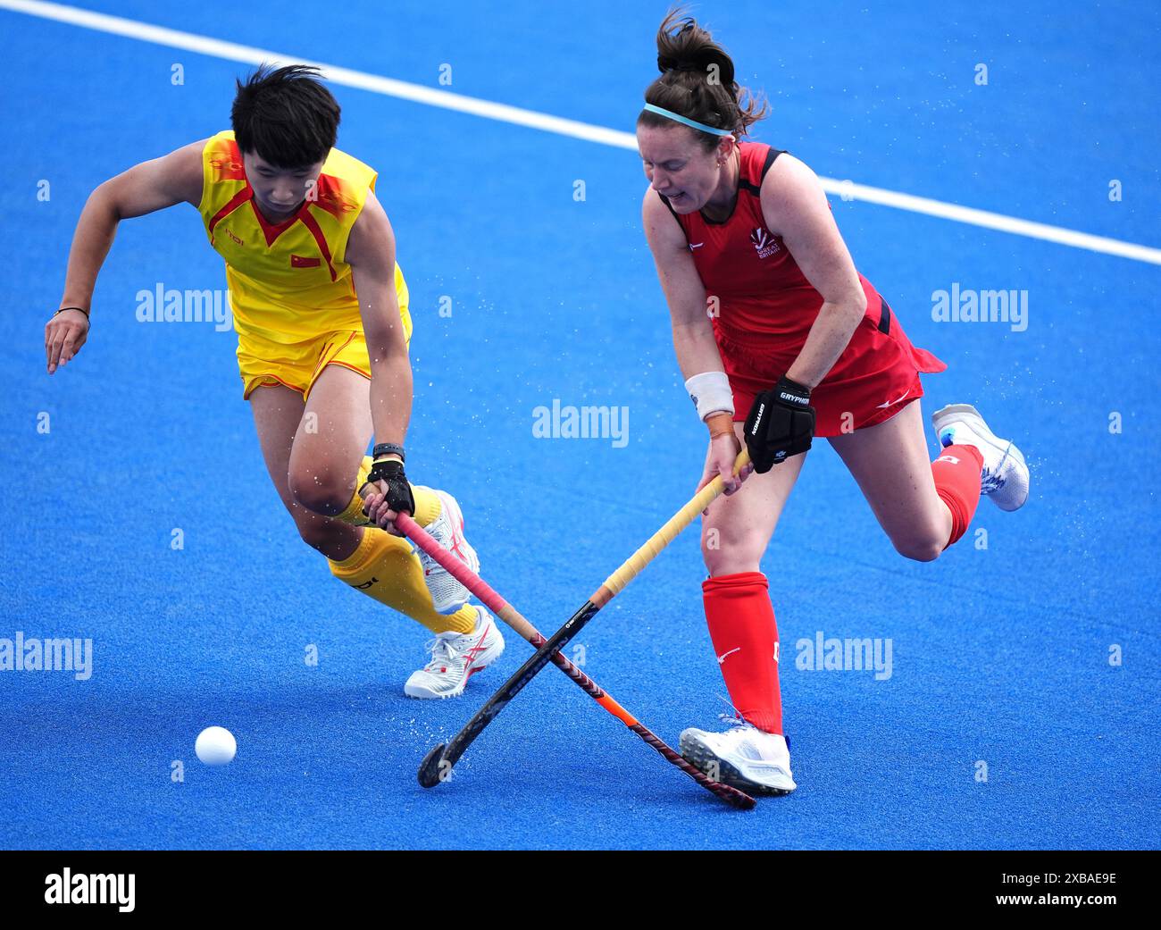 Great Britain's Laura Roper and China's Liu Chencheng (left) battle for ...
