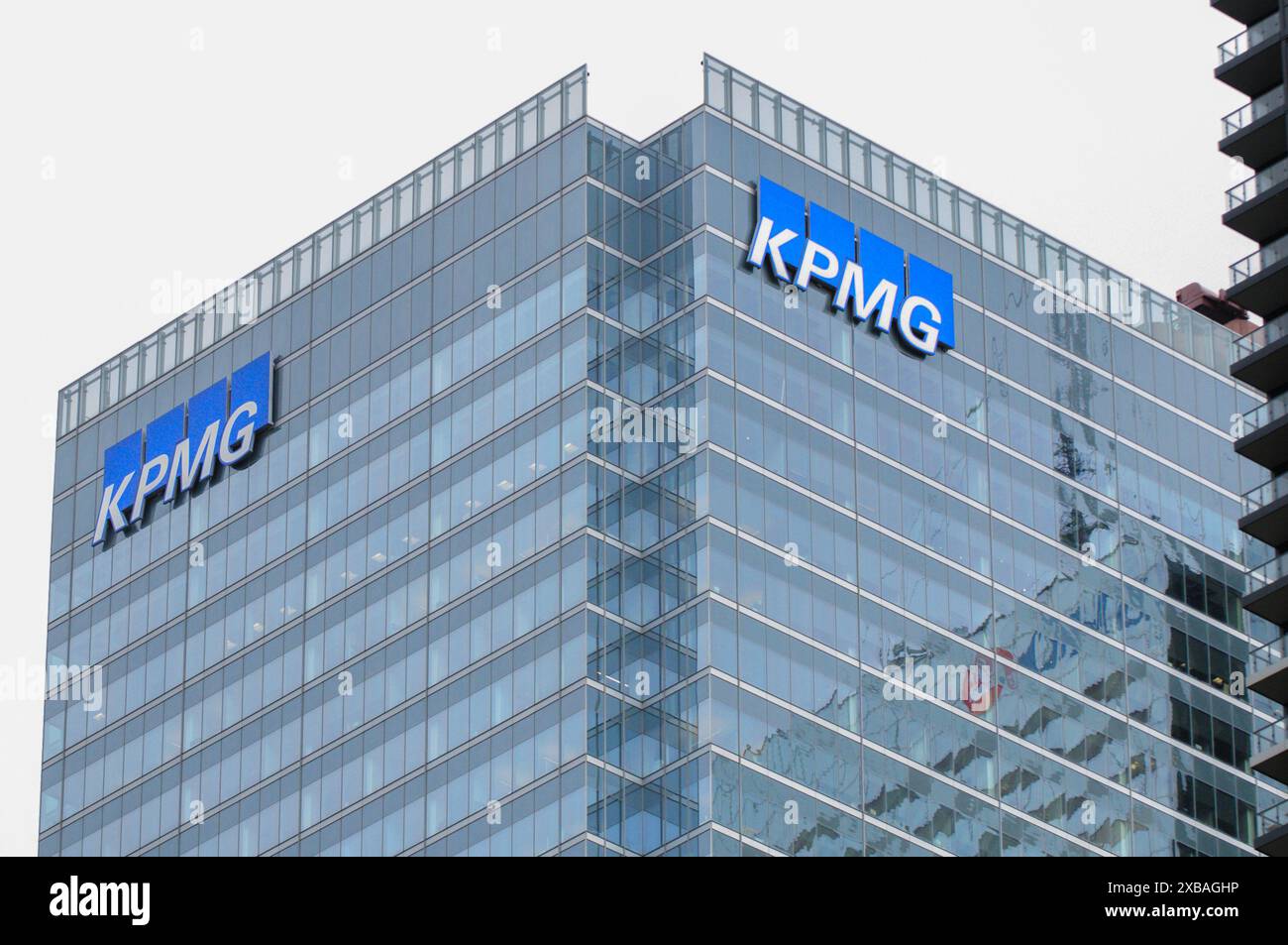 Toronto, ON, Canada -June 5, 2024: View at KPMG sign. KPMG is a ... Toronto, ON, Canada -June 5, 2024: View at KPMG sign. KPMG is a ...