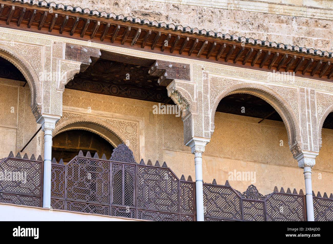 Arches, columns, and railing of a balcony with Islamic style ...