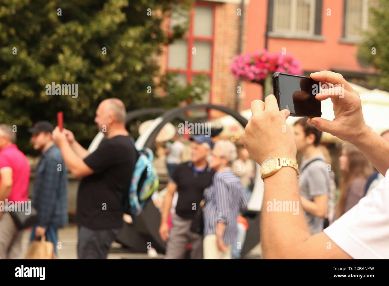 Hand holding phone and snap a picture, travel memories. Snap a picture ...