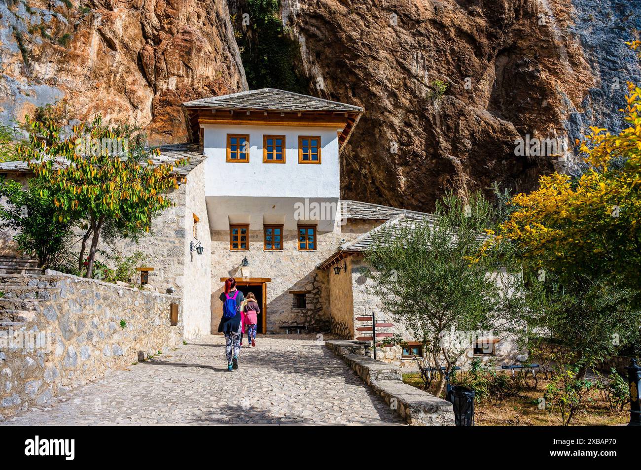 Tourists visiting Buna River spring in the town of Blagaj near Blagaj ...