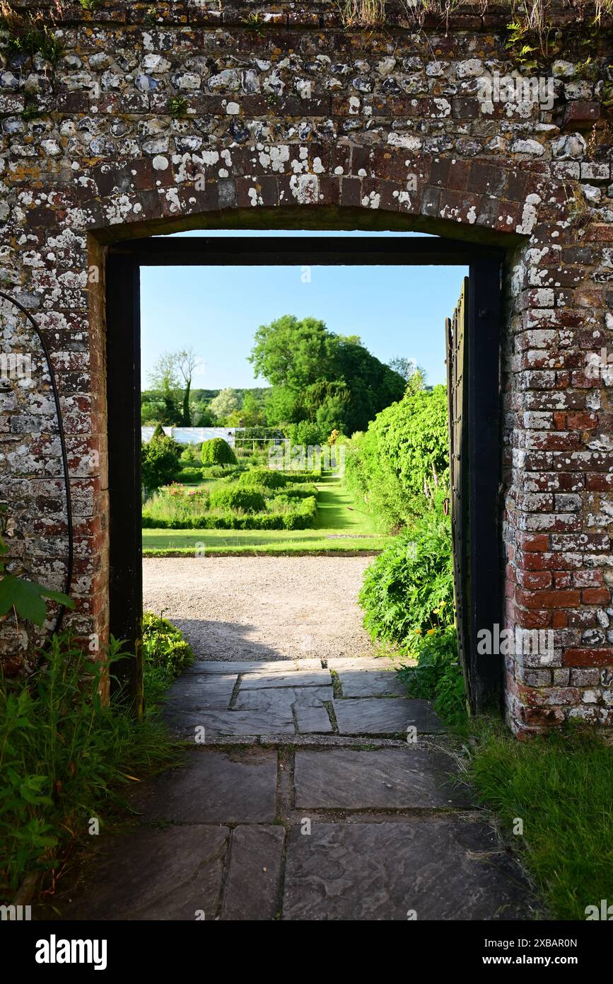 A doorway in a brick wall in the rear garden of Littlecote House, a ...