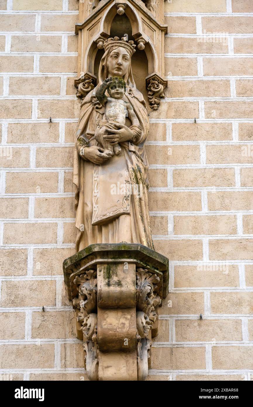 Stone sculpture of the Virgin Mary. Architectural feature of the ...