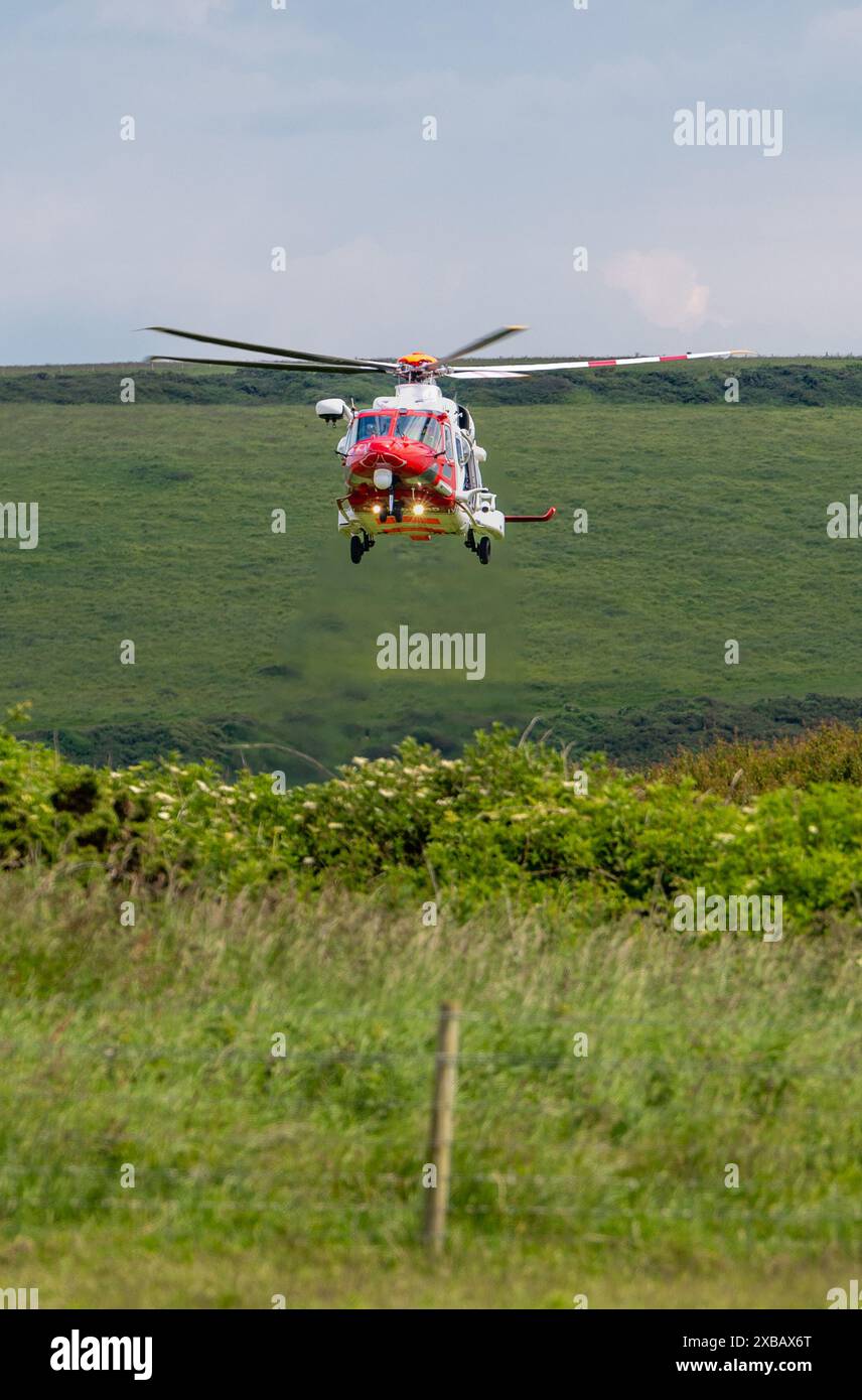 The coaast guard search & rescue helicopter prepares to land on the ...