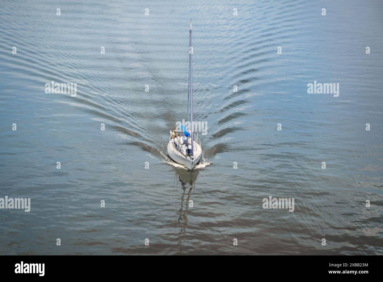 The yacht is sailing in the open sea. Sailboat. Vacations by the sea ...