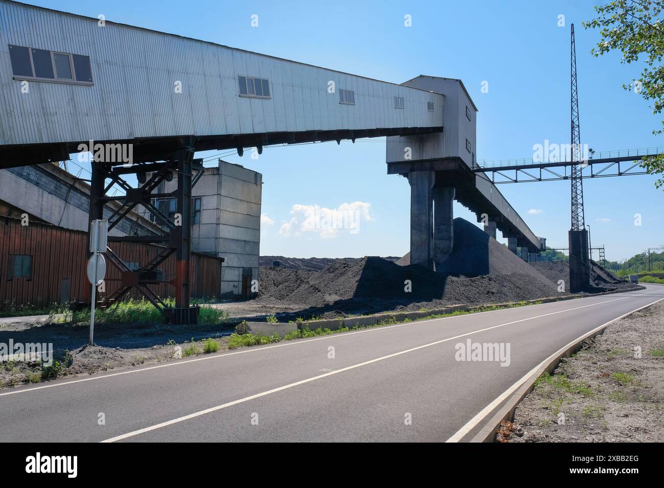 Coal mining and storage. Close-up of coal industry objects Stock Photo ...