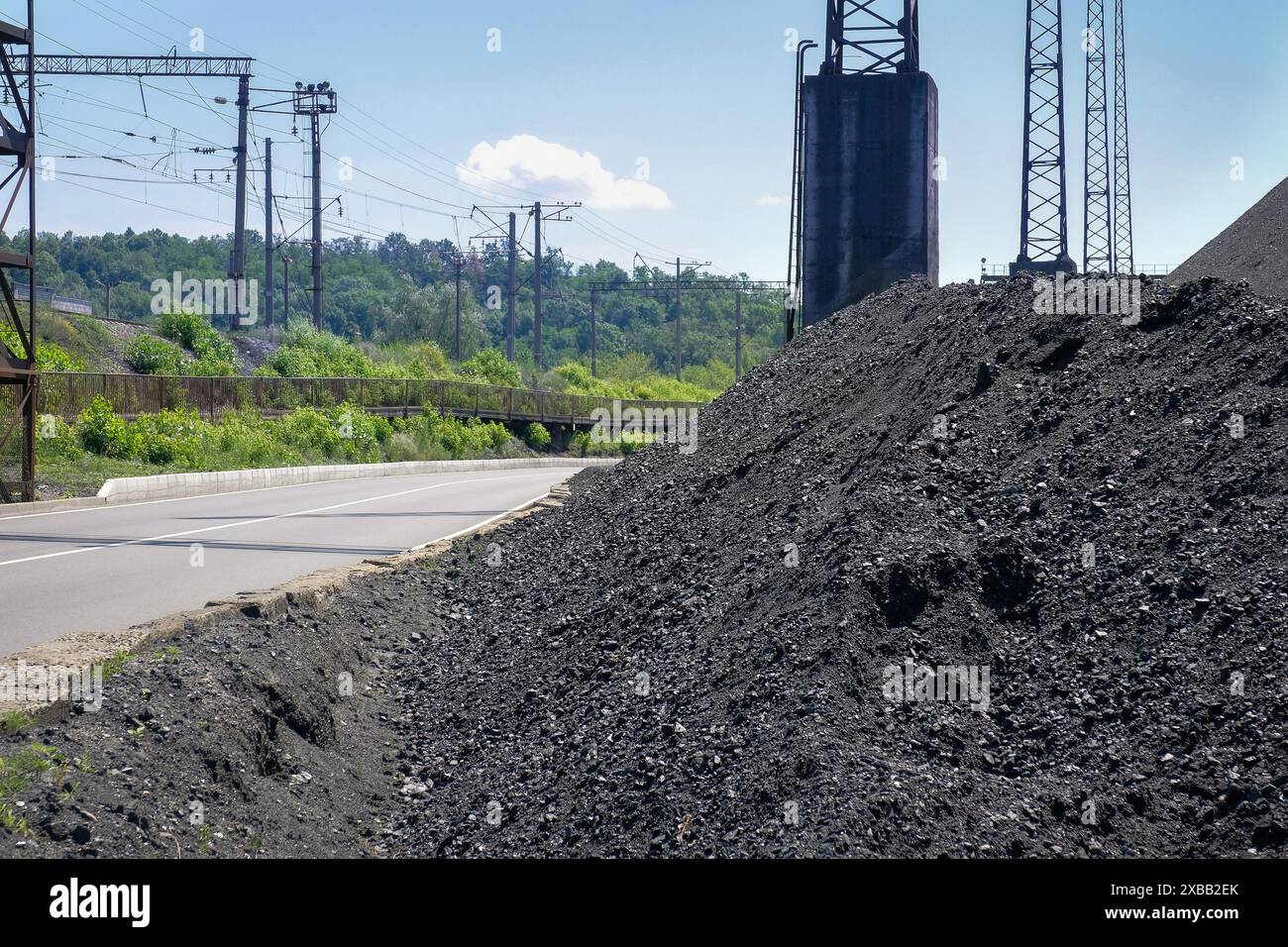 Natural heaps of industrial coal. Coal mine. Production of useful ...
