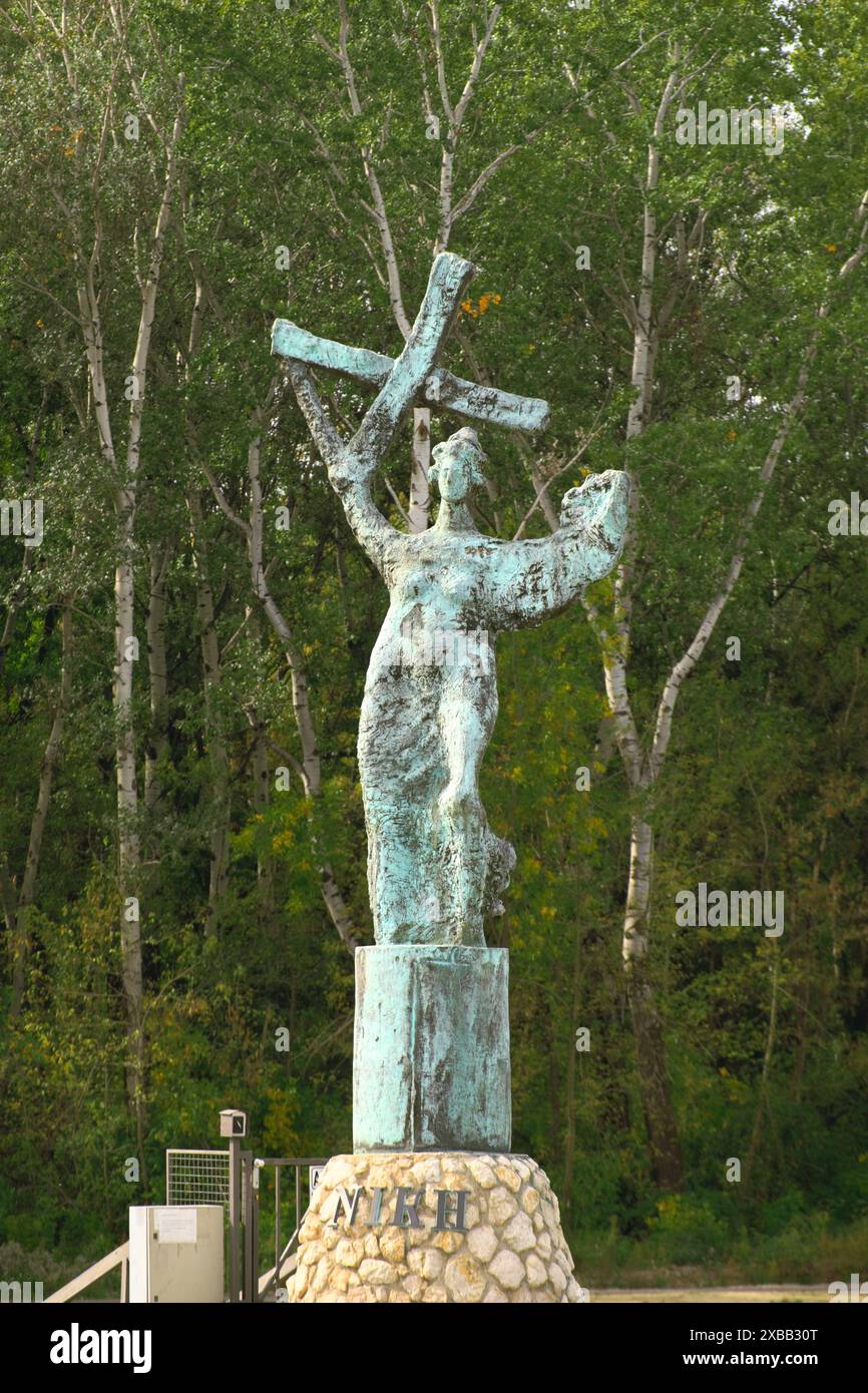 the bronze statue of Goddess Nike along the Danube River in the ...