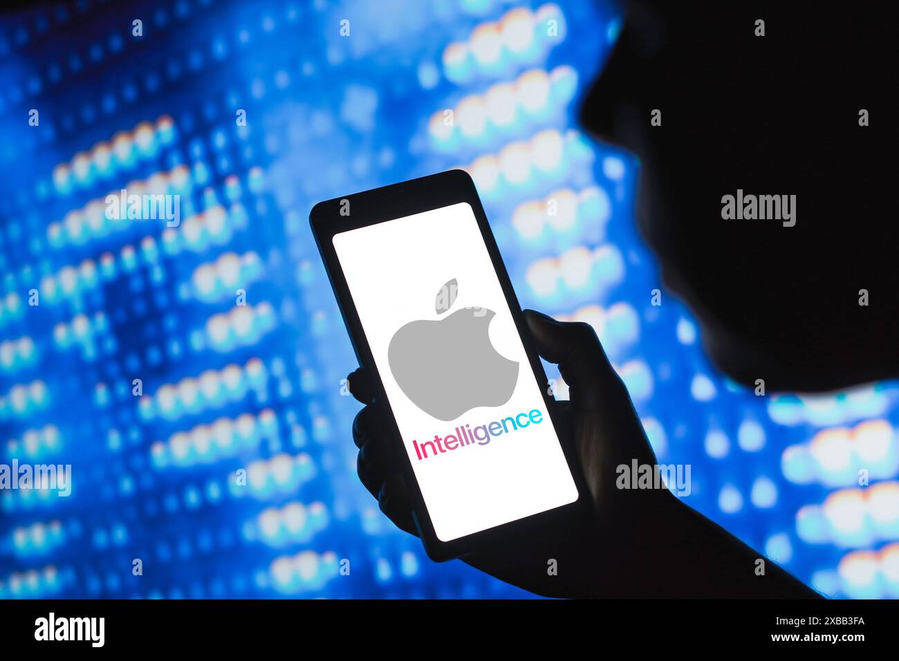 In this photo illustration, the Apple Intelligence logo is displayed on ...