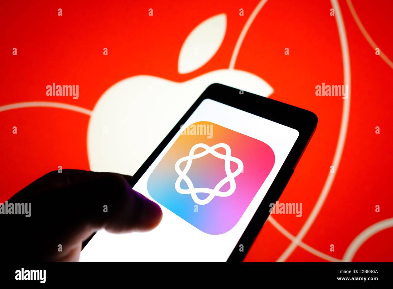 In this photo illustration, the Apple Intelligence logo is displayed on ...
