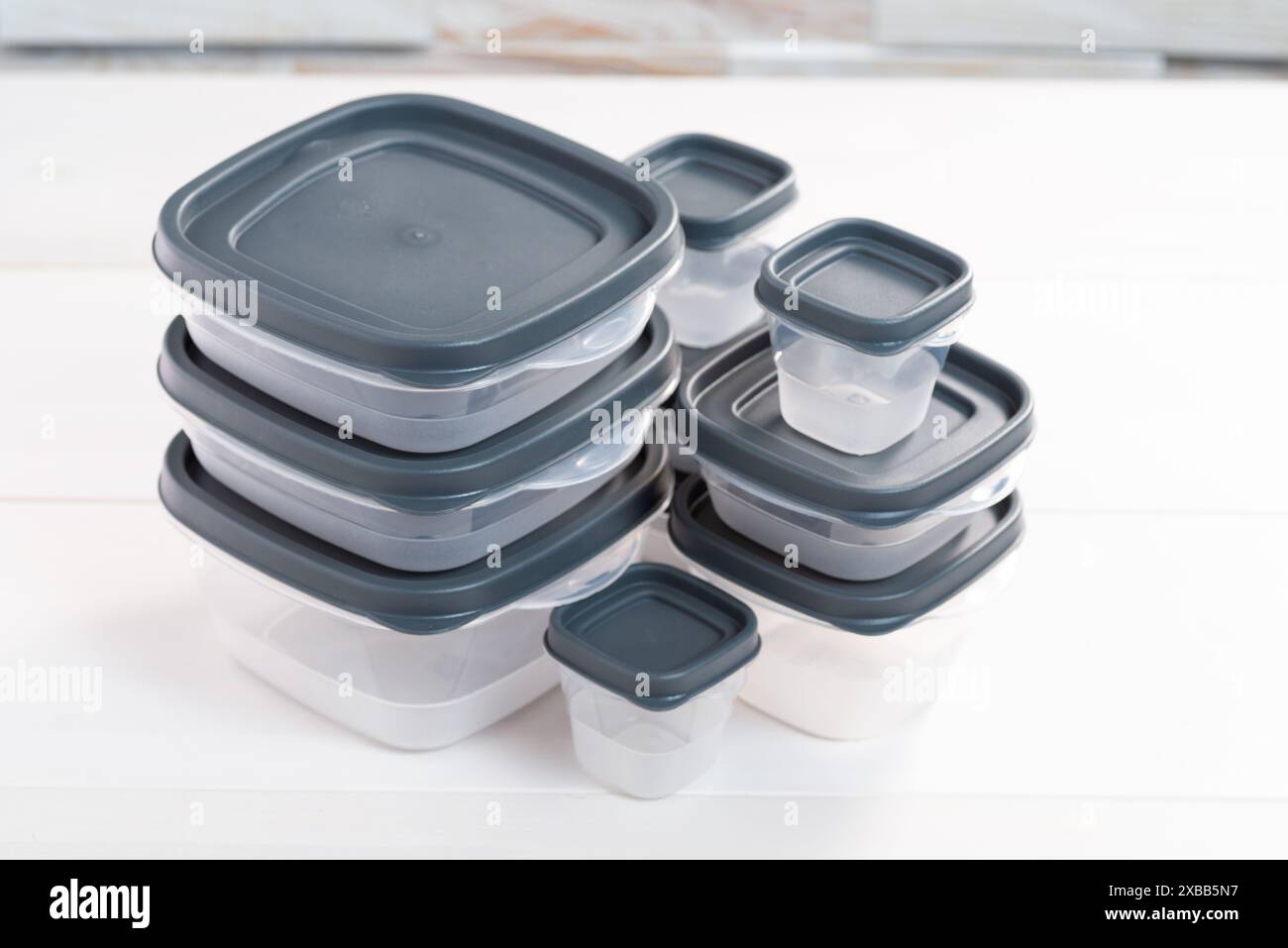 Stack of food plastic containers of different sizes. Storing food for ...