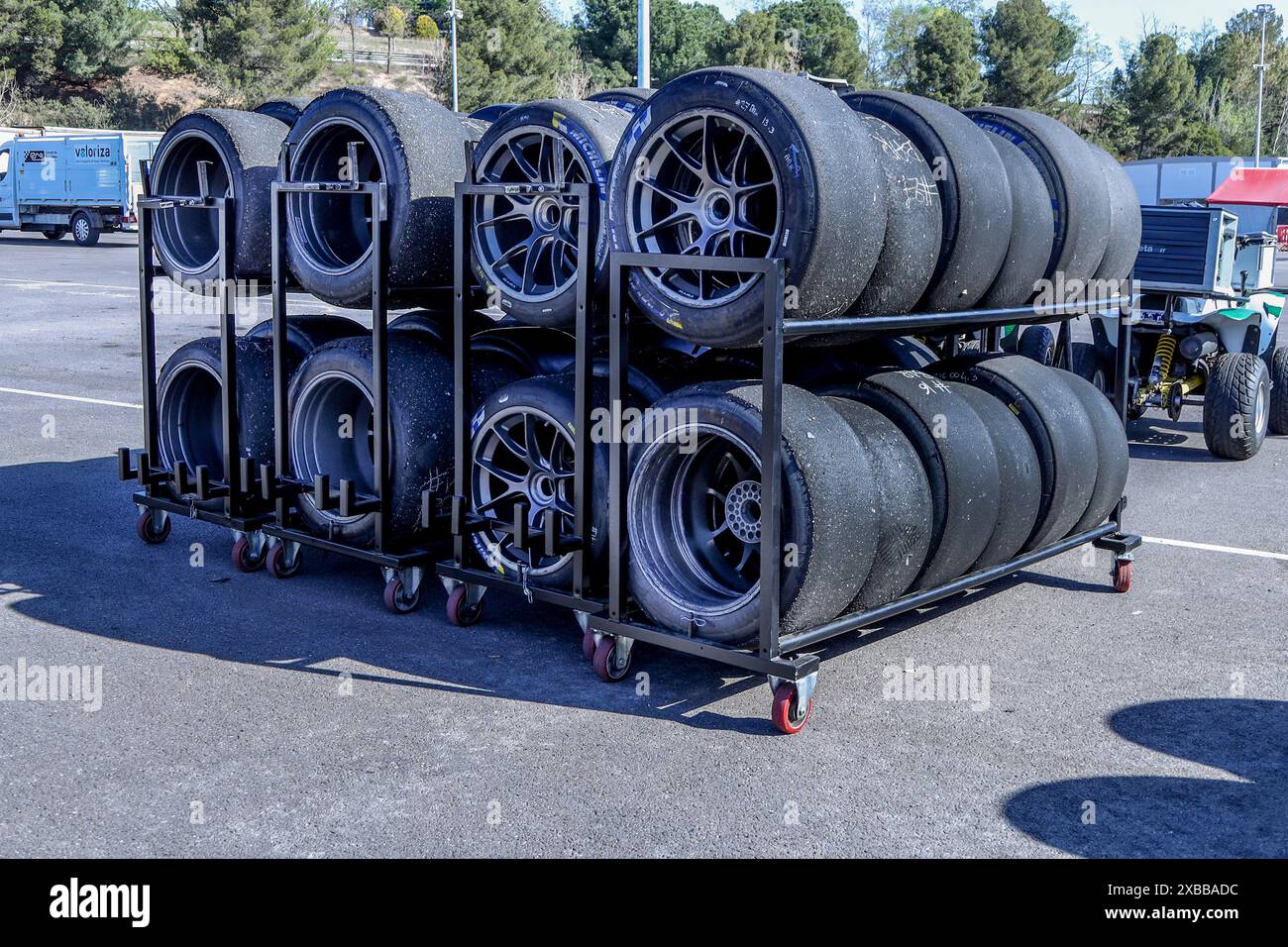 European Le Mans car race wheels and tyres in a stack in the paddock at ...