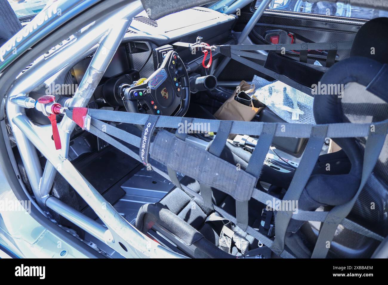 Interior of Porsche 911 GT3 Cup race car with door off at 4 hours of ...