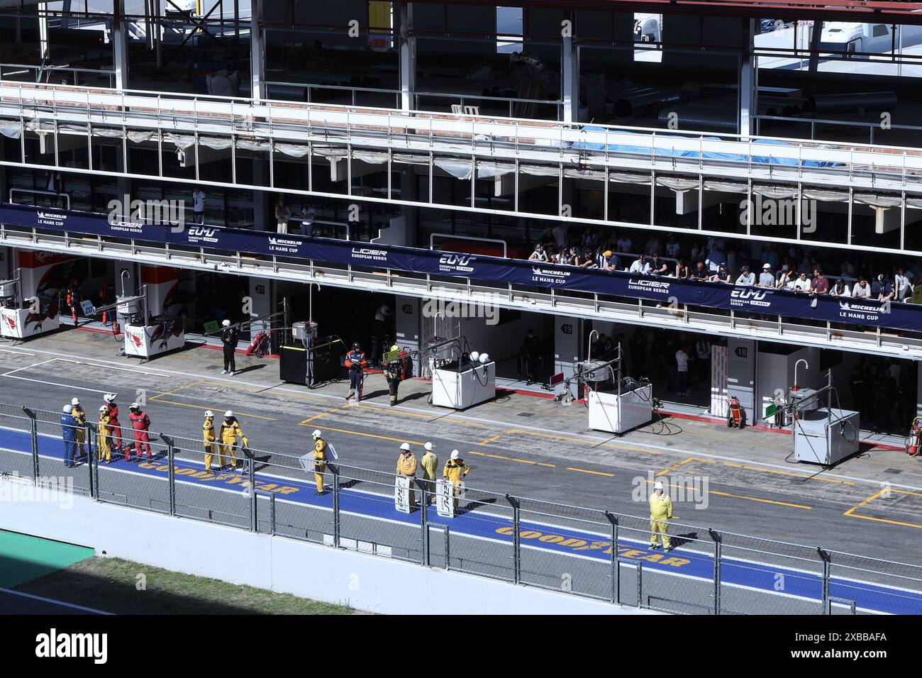 Pit lane and garages for the European Le Mans Series race at Circuit of ...