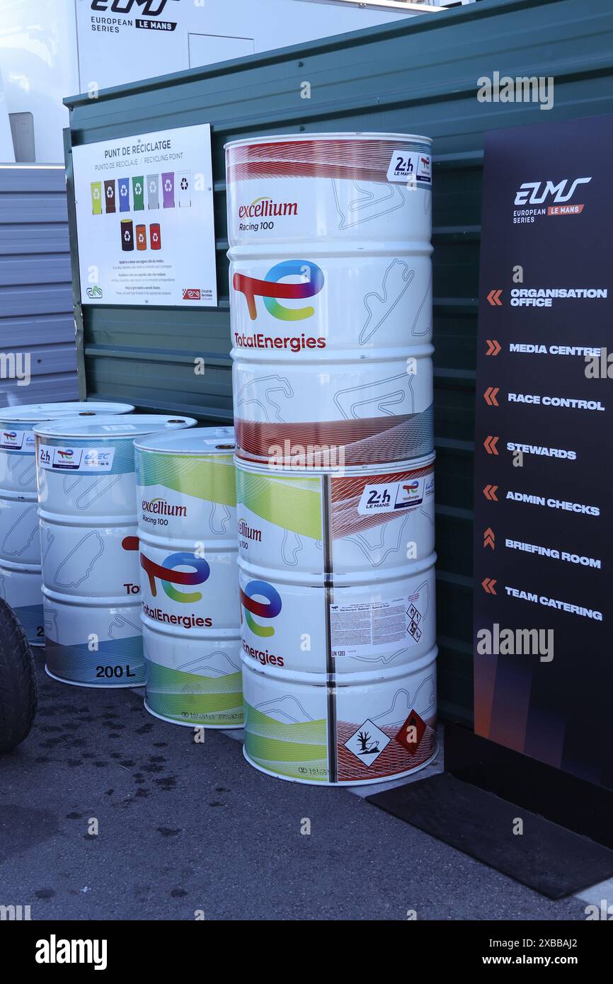 High performance motor racing engine oil barrels Stock Photo - Alamy