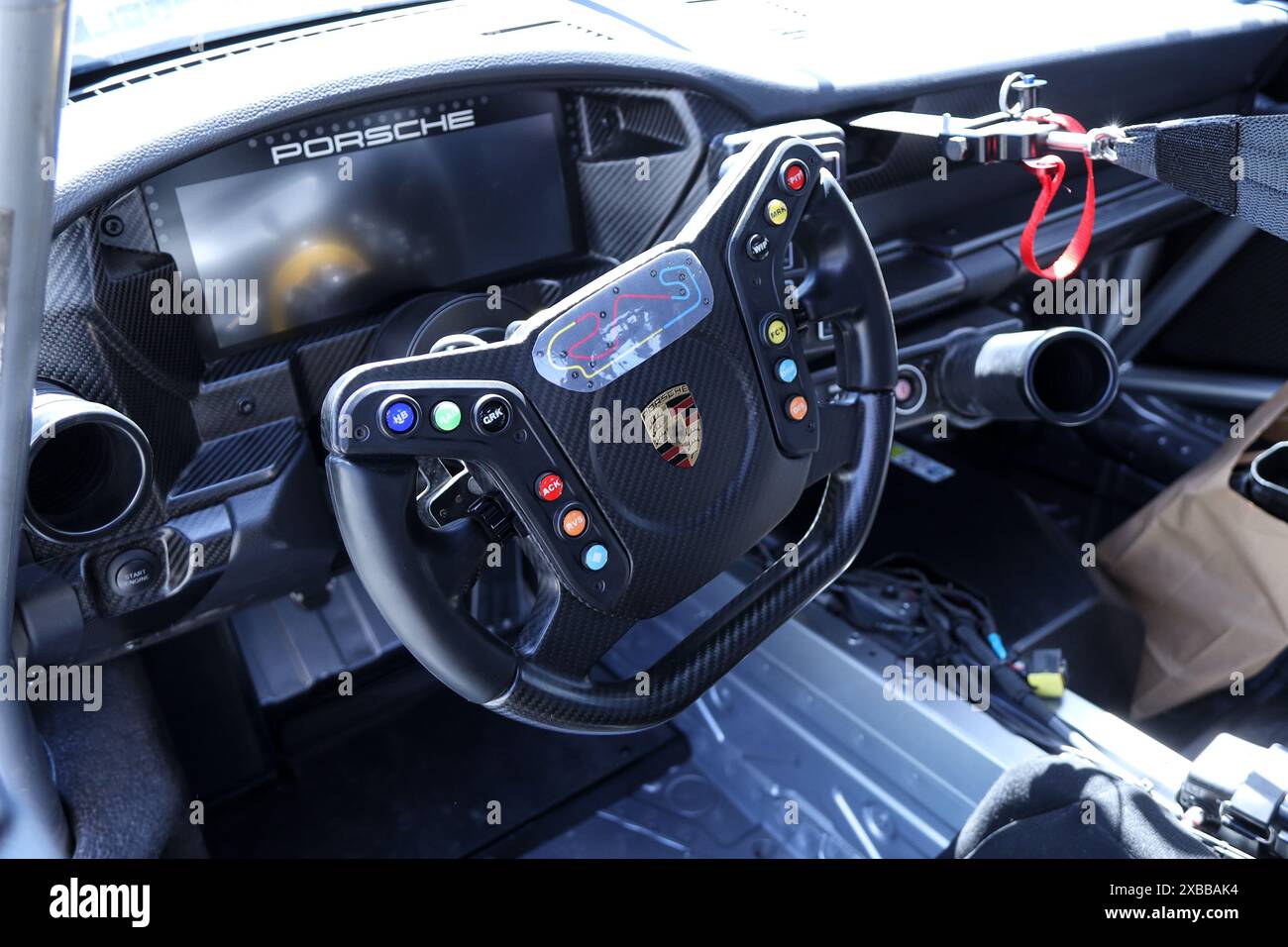 Interior of Porsche 911 GT3 Cup race car with door off at 4 hours of ...