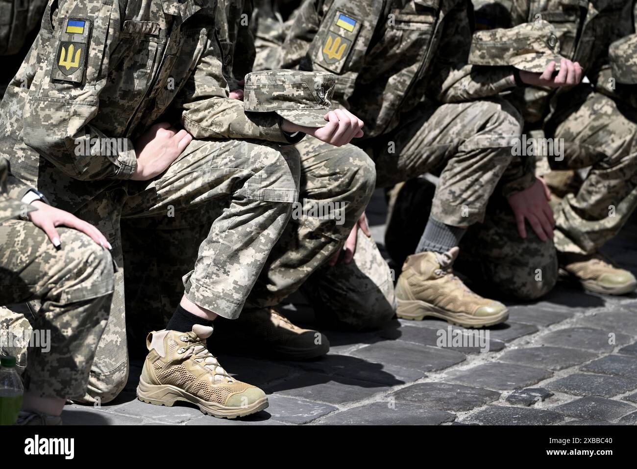 Ukrainian soldiers kneel during funerals ceremony. memorial service ...
