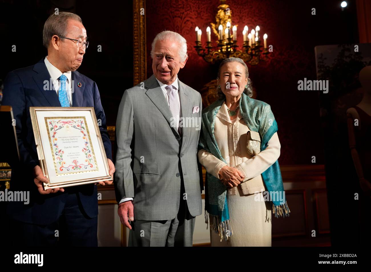 King Charles III (centre) presents the Harmony Award to Ban Ki-moon (left), the former United ...