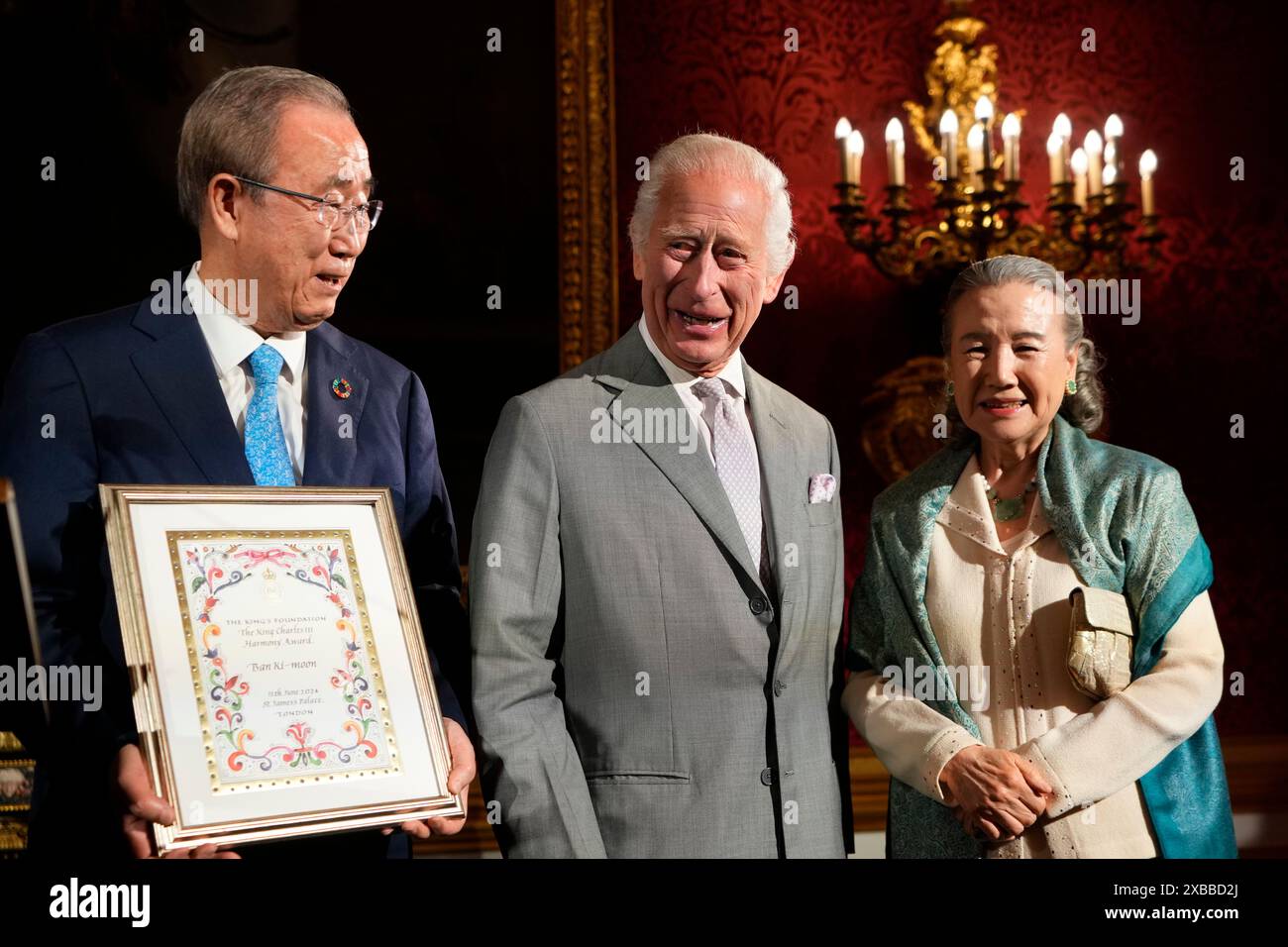 King Charles III (centre) presents the Harmony Award to Ban Ki-moon (left), the former United ...