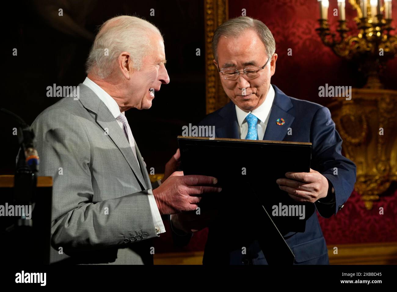 King Charles III (left) presents the Harmony Award to Ban Ki-moon, the former United Nations ...