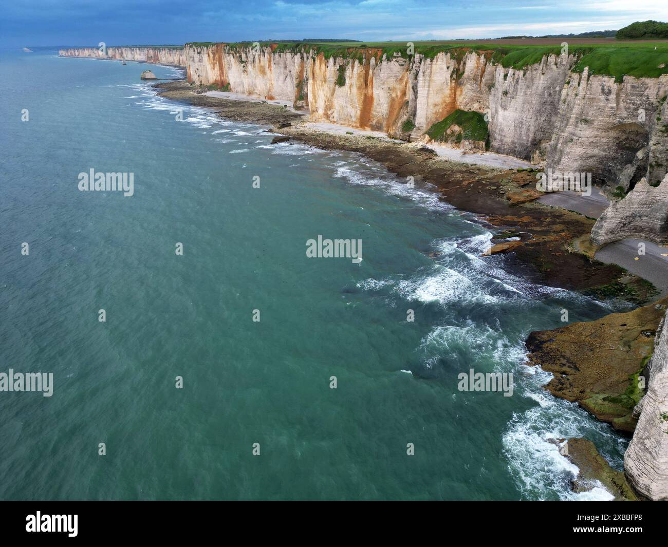 Aerial view of the famous white limestone cliffs near Etretat during ...