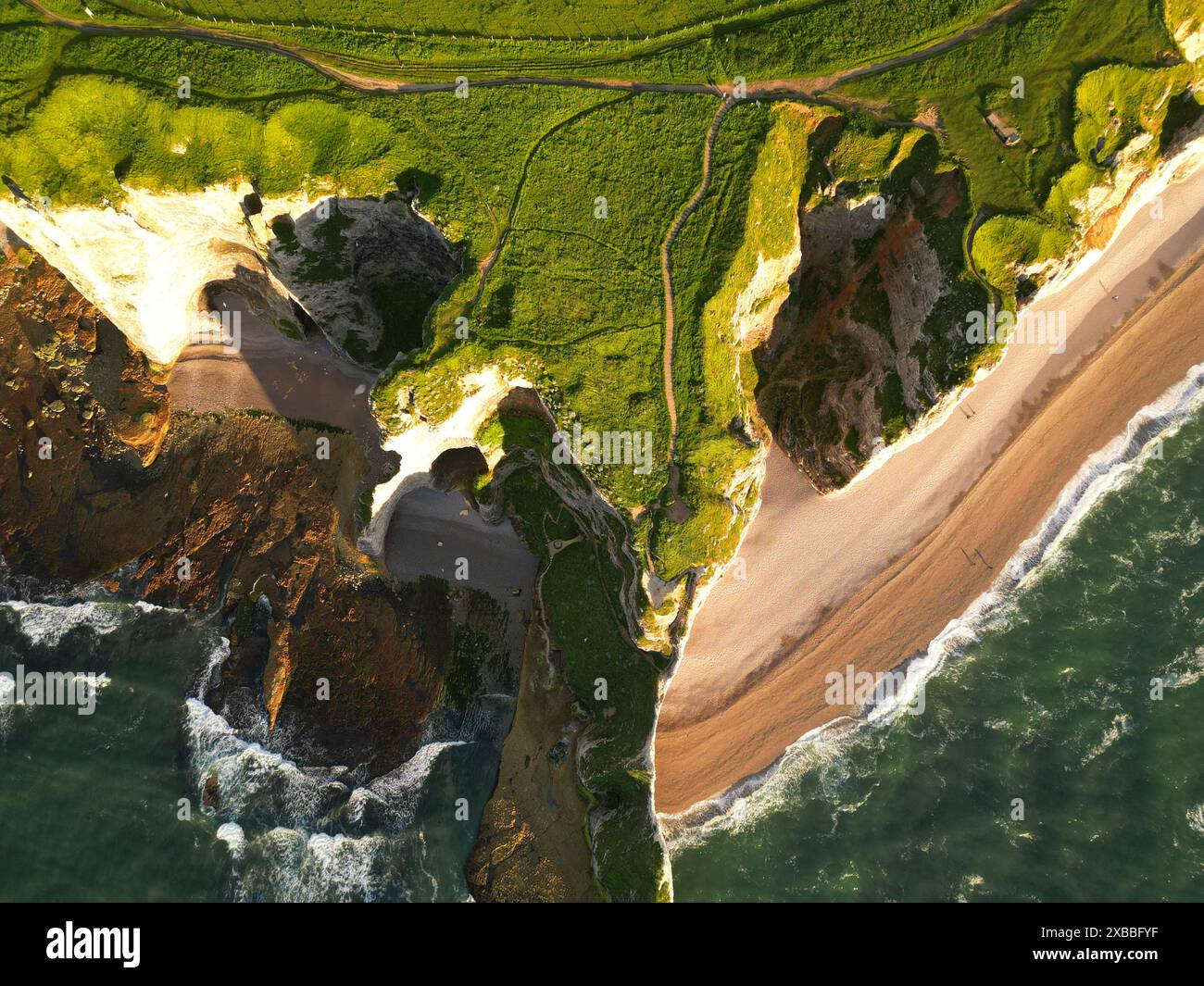 Aerial view of the famous white limestone cliffs near Etretat during ...