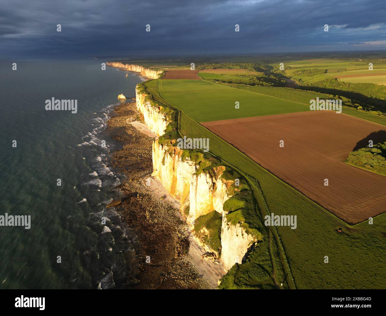Aerial view of the famous white limestone cliffs near Etretat during ...