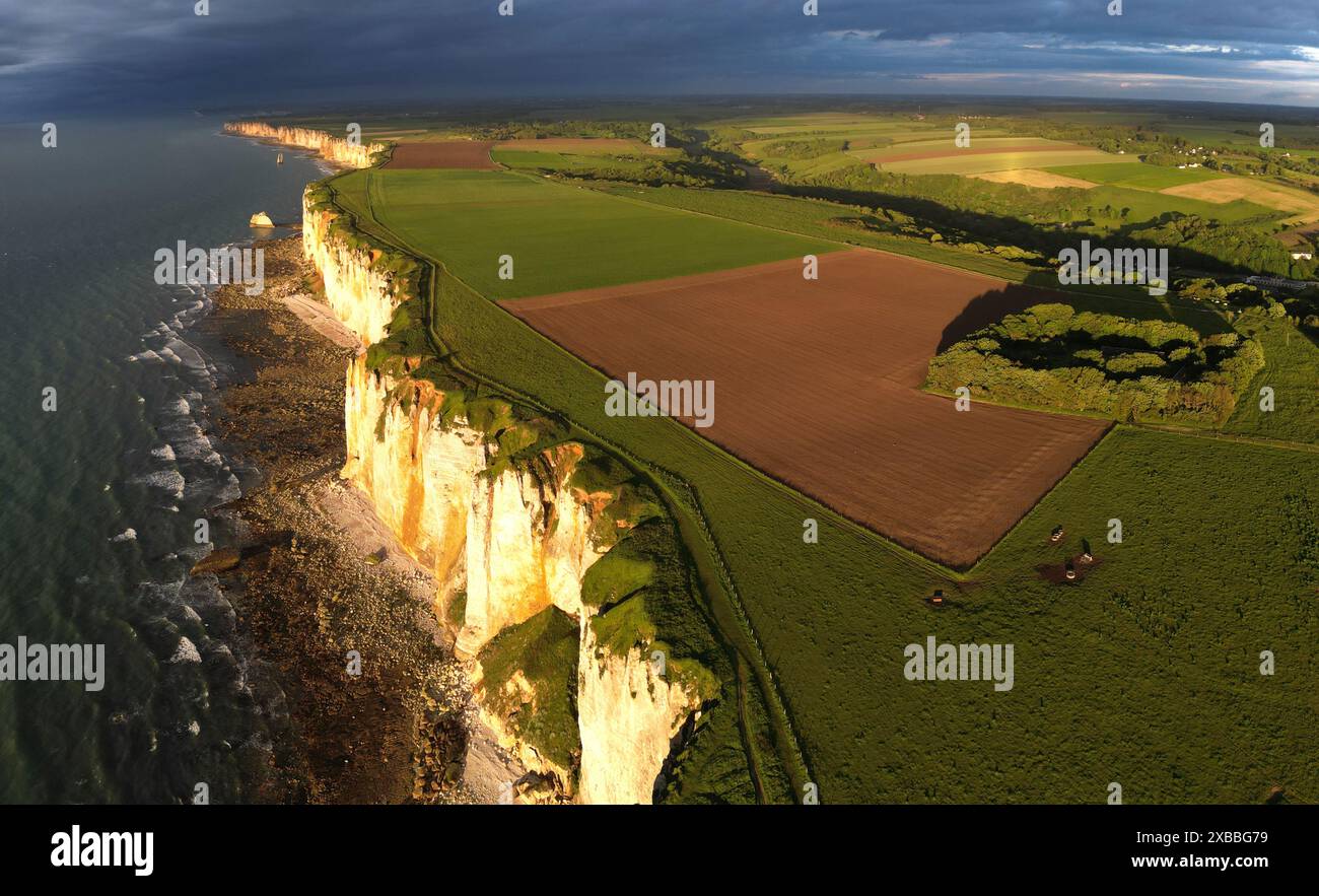 Aerial view of the famous white limestone cliffs near Etretat during ...
