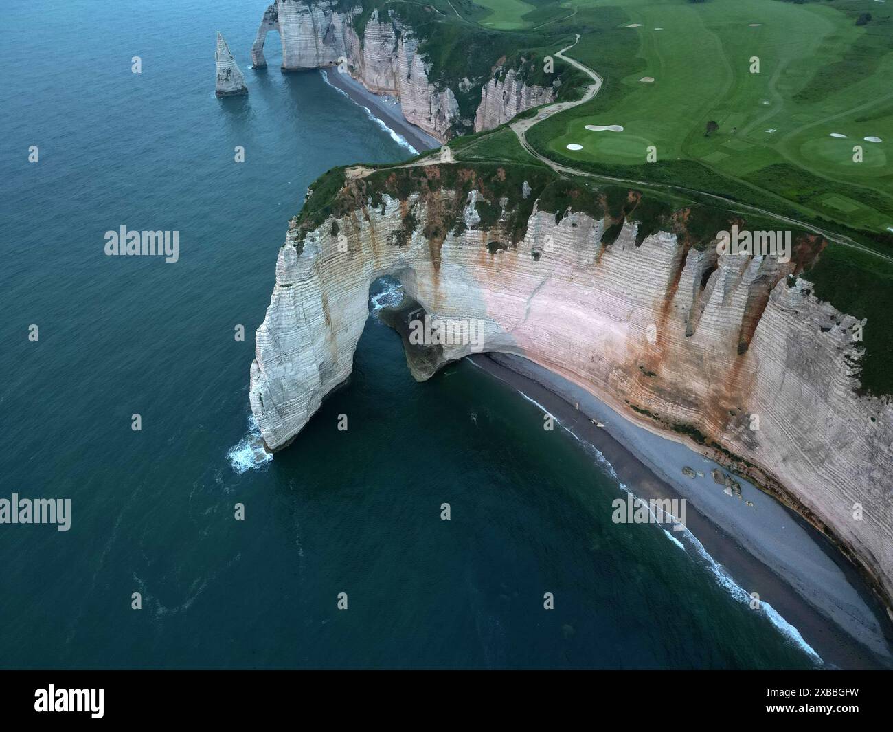 Aerial view of the famous white limestone cliffs near Etretat during ...