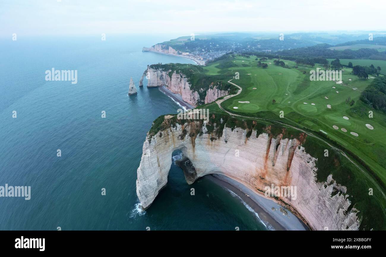 Aerial view of the famous white limestone cliffs near Etretat during ...
