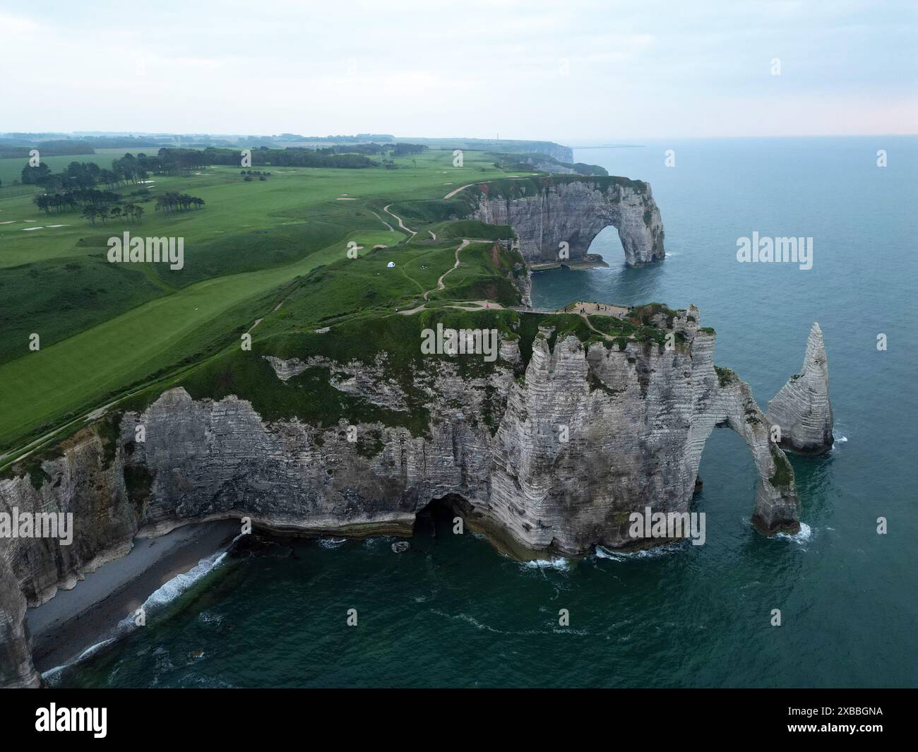 Aerial view of the famous white limestone cliffs near Etretat during ...