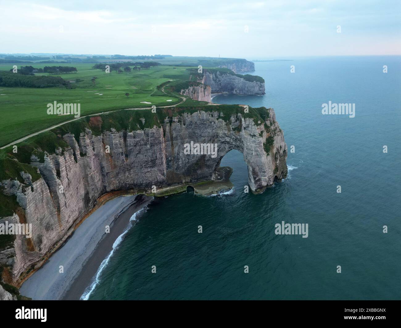 Aerial view of the famous white limestone cliffs near Etretat during ...
