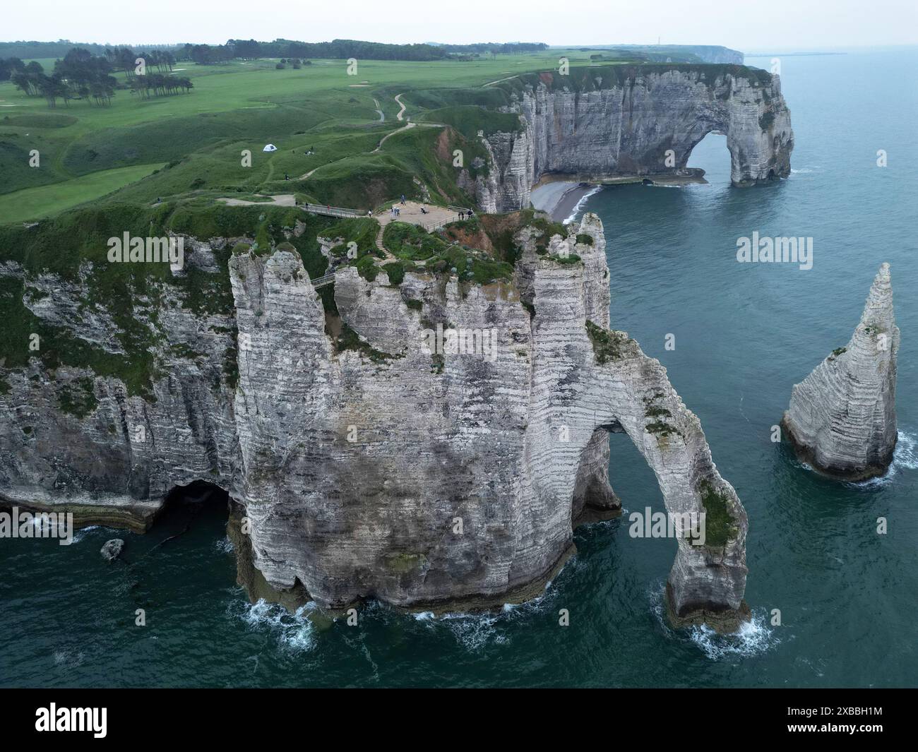 Aerial view of the famous white limestone cliffs near Etretat during ...