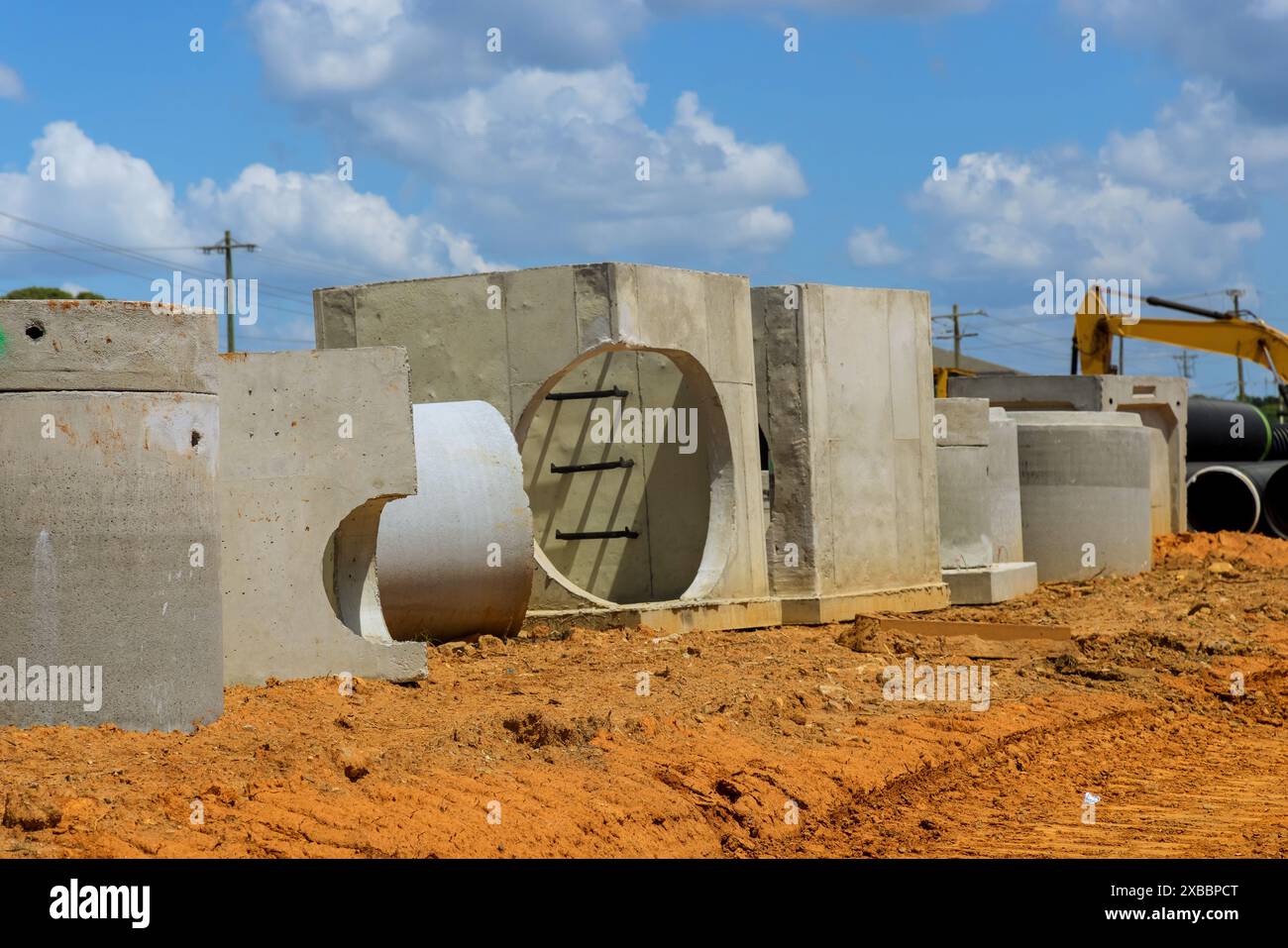Stack of concrete drainage wells for discharge of water on construction ...