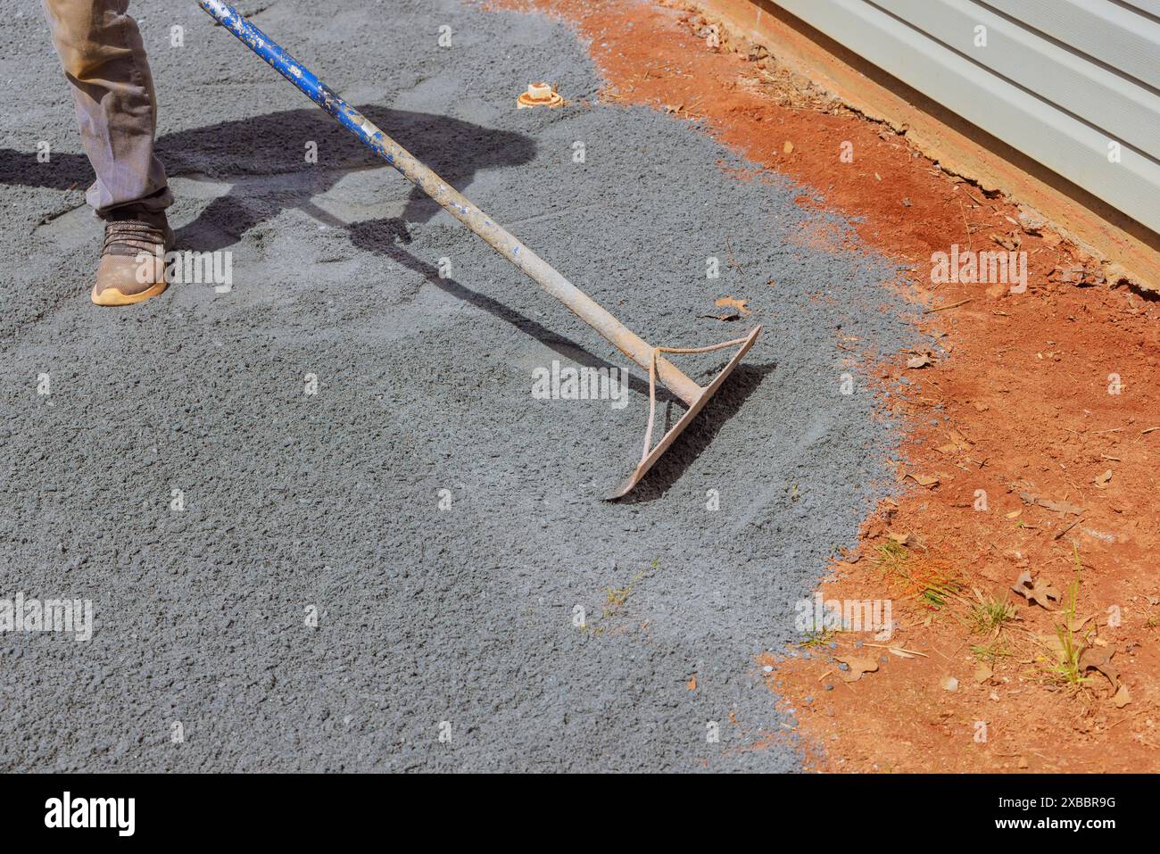 Ground is leveled, filled with fine gravel stones for pouring concrete ...