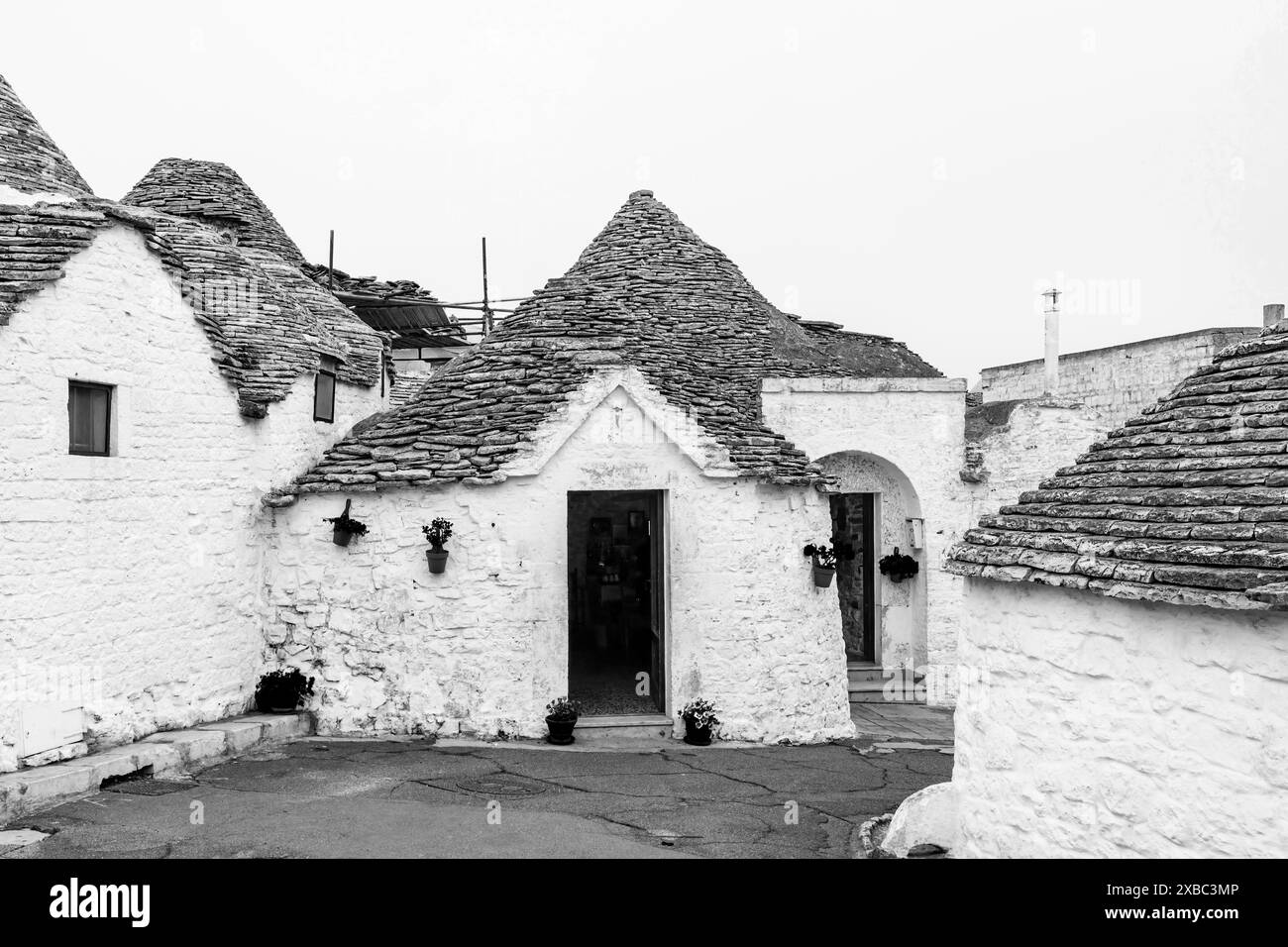Famous historical old dry stone trulli houses with conical roofs in ...