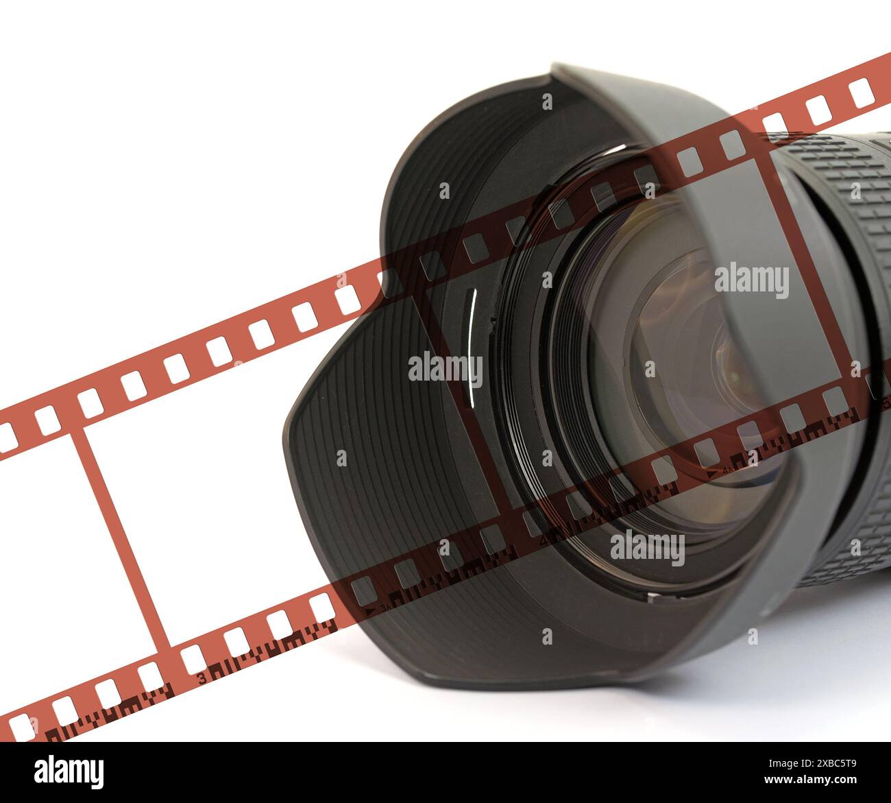 Camera lens and analog film, 3d-illustration, against white background ...